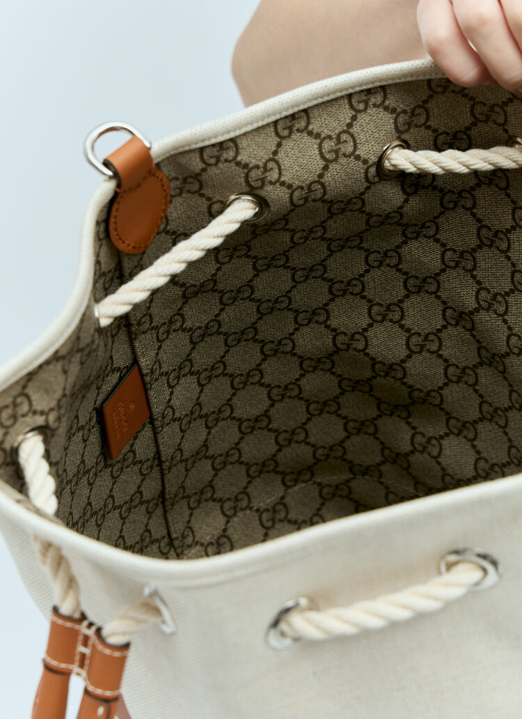 Gucci Women's' Logo Print Drawstring Shoulder Bag in Beige | LN-CC®